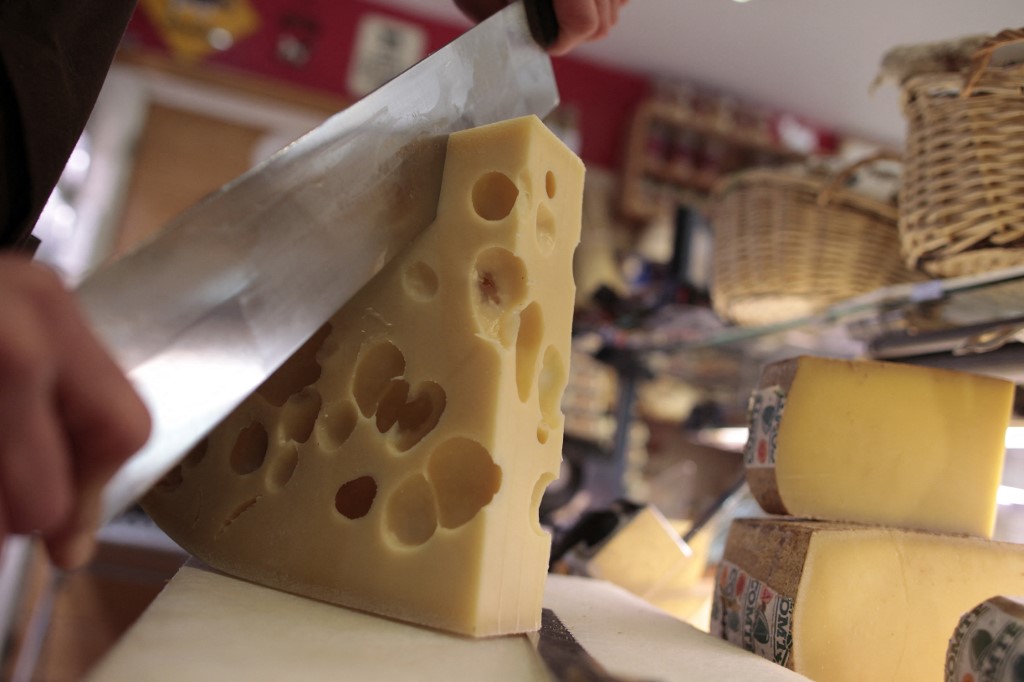 Why are Swiss angry with Americans about Gruyere cheese?