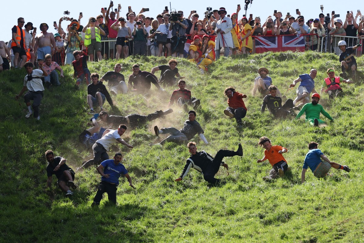 Inside Germany: Cheese rolling, grand slamming and a chancellor defamed